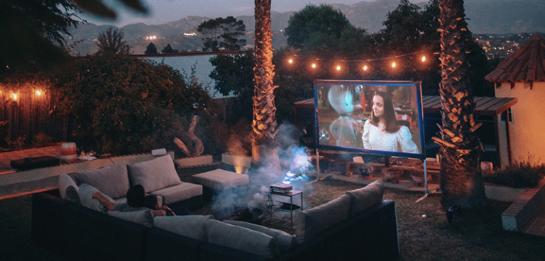 Top 5 Films for Your Outdoor Movie Theater - LUX Landscape Lighting